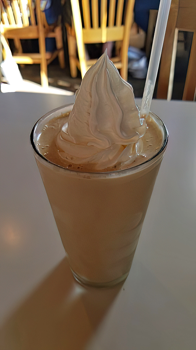 This peanut butter shake represents liquid happiness in a glass, thick enough to require serious commitment and patience.