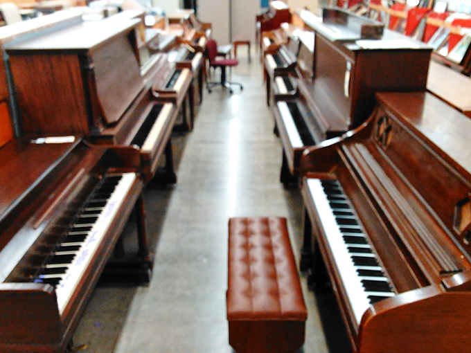 Piano rows creating a musical wonderland where Beethoven meets budget-conscious shopping dreams perfectly.