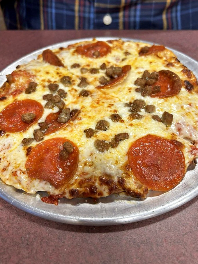 This personal pizza with pepperoni and ground beef isn't trying to be artisanal or fancy&mdash;it's just trying to make you happy. Mission accomplished.