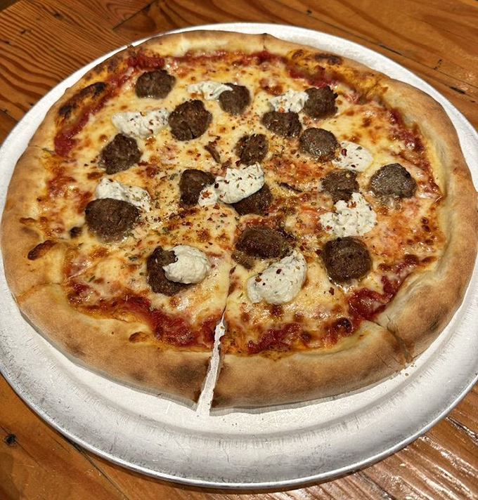 Pizza perfection isn't just about the crust (though this one's magnificent)&mdash;it's about balance, from sauce to those pillowy ricotta clouds.