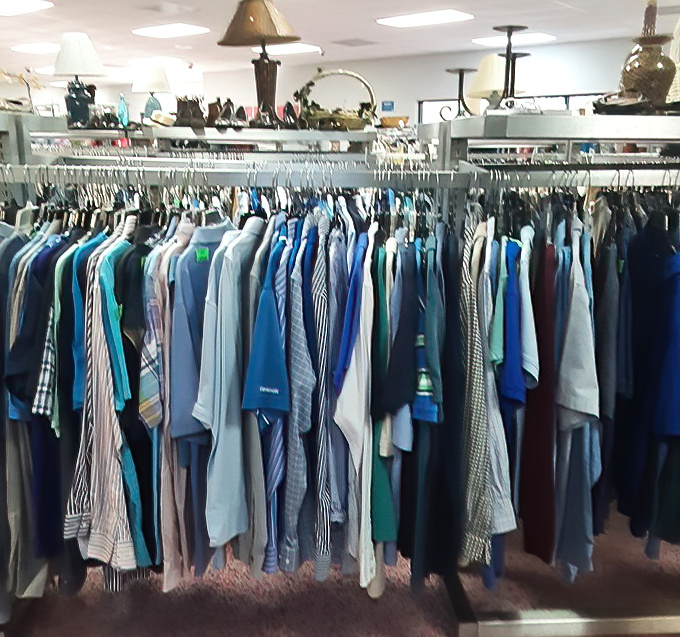 The dress shirt section: where business casual meets beach vacation. Every hue of the corporate rainbow awaits its next Zoom meeting.