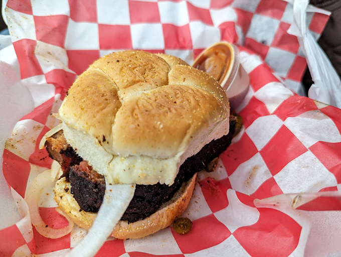 This sandwich doesn't just blur the line between breakfast and lunch—it obliterates it with pork belly that's been transformed by smoke and time.