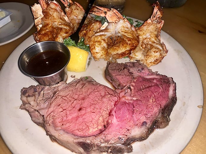 Surf meets turf in perfect harmony. Medium-rare prime rib alongside golden prawns&mdash;proof that some of life's best relationships are opposites.