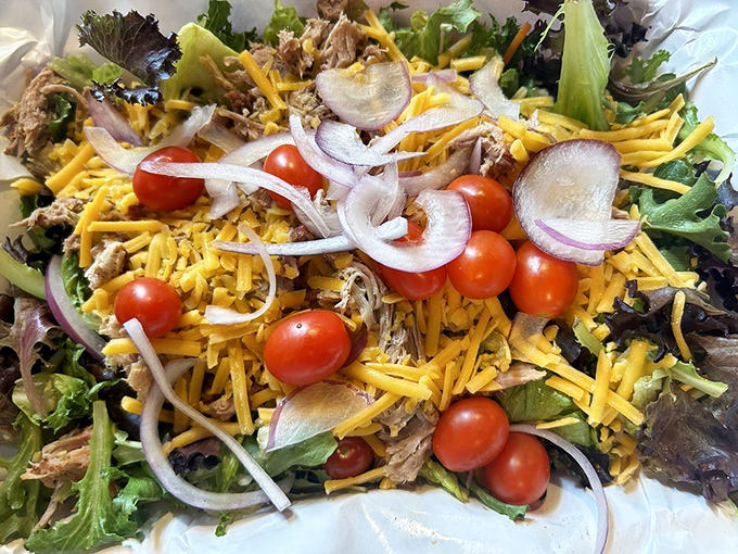 Barbecue goes light(ish)&mdash;pulled pork atop fresh greens with cheese and veggies. The salad that meat-lovers order without feeling like they're compromising. 