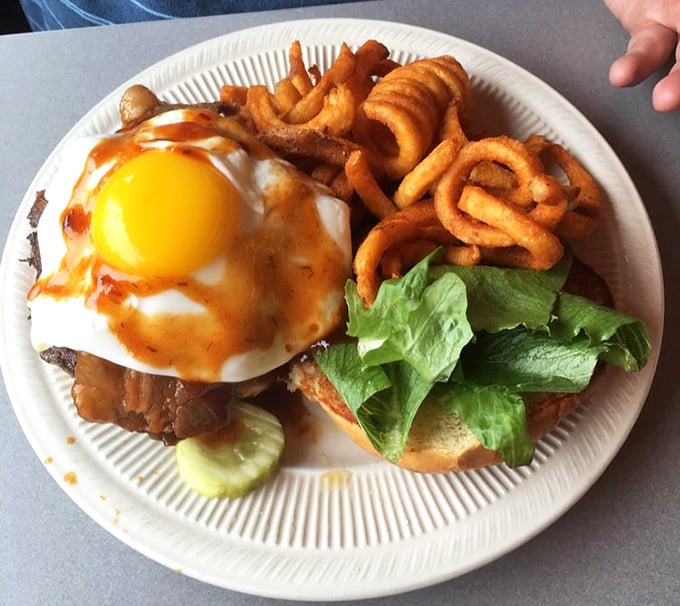 The Red Eye Burger: a breakfast-meets-dinner masterpiece that'll have you questioning all your life choices happily.