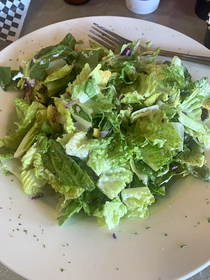 A simple salad that knows its role: the refreshing opening act before the headlining steaks take center stage.