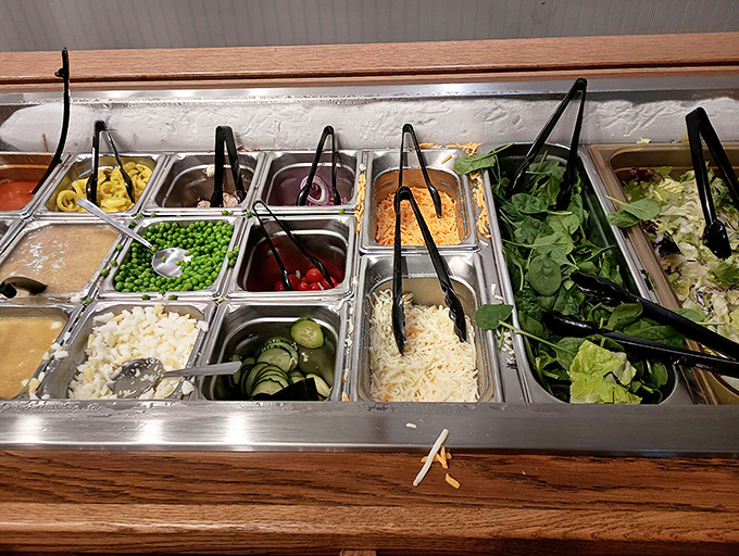 The salad bar: where virtuous intentions meet reality. Yes, there are vegetables, but they're just the opening act for what comes next.