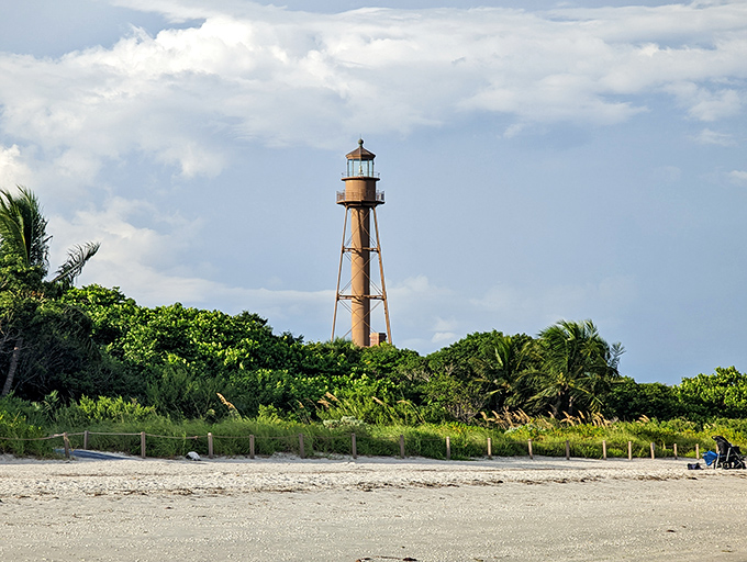 Standing tall since 1884, this iron sentinel has witnessed countless perfect sunsets. The lighthouse that launched a million vacation photos. 