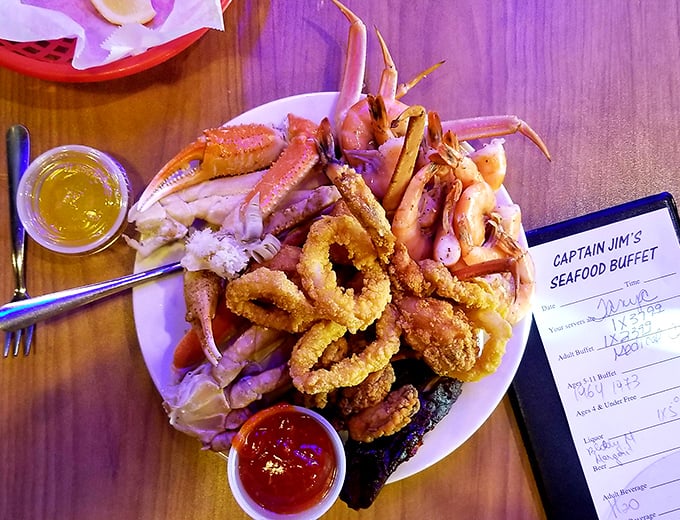 The ultimate treasure map: X marks the spot where crab legs, fried seafood, and dipping sauces create culinary gold.