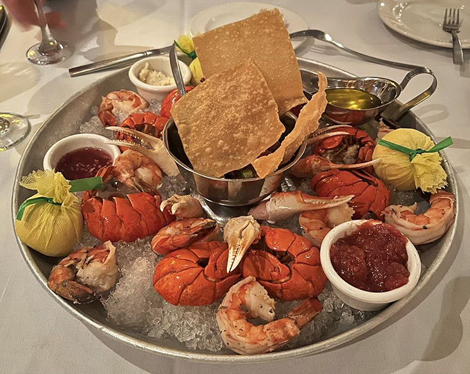 This seafood platter looks like Neptune's personal gift basket, complete with lobster tails that practically beg for butter.