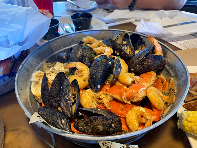The seafood boil that launched a thousand bibs. Mussels, shrimp, and crab having the world's most delicious pool party. 
