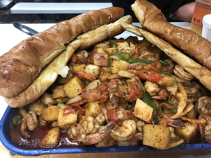 The legendary shrimp tray&mdash;a mountain of garlicky goodness flanked by bread sentinels. This isn't a meal; it's a seafood celebration.