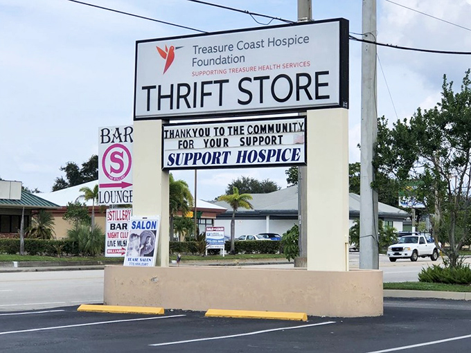 The sign says it all - this boutique elevates thrift shopping to an art form.