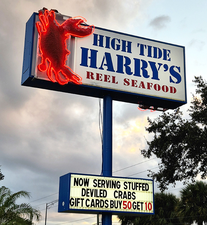 The neon crab sign doesn't just announce your arrival&mdash;it beckons like a lighthouse guiding hungry sailors to safe harbor.