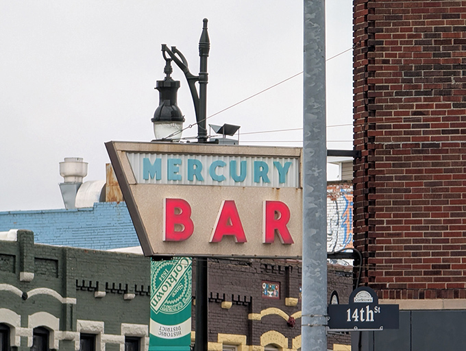 The vintage sign glows with promise, a beacon for burger lovers that's been guiding hungry Detroiters to flavor town for years.