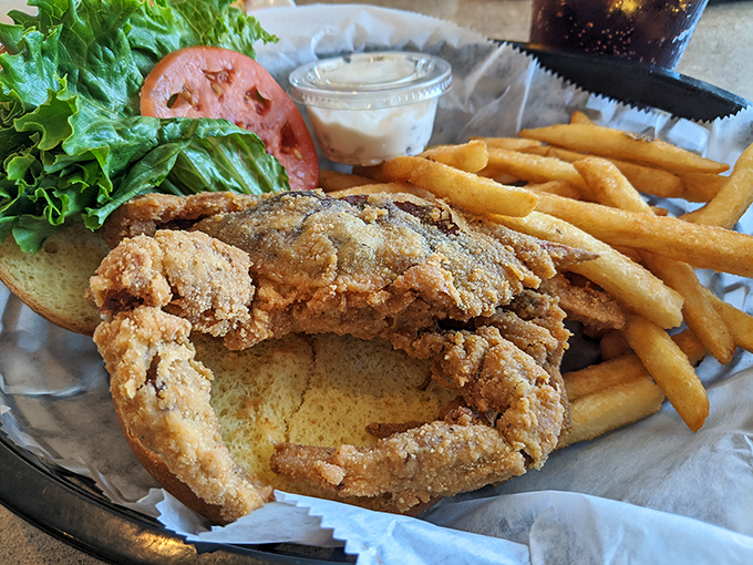 The soft shell crab sandwich&mdash;where the entire crustacean gets the golden-fried treatment. It's crunchy, savory, and gloriously messy in all the right ways.