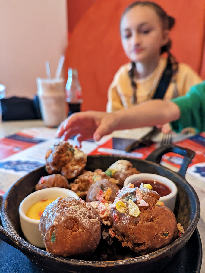 These aren't ordinary donut holes&mdash;they're interplanetary dessert spheres, dusted with cosmic sugar and served with dipping sauces for extra gravitational pull.