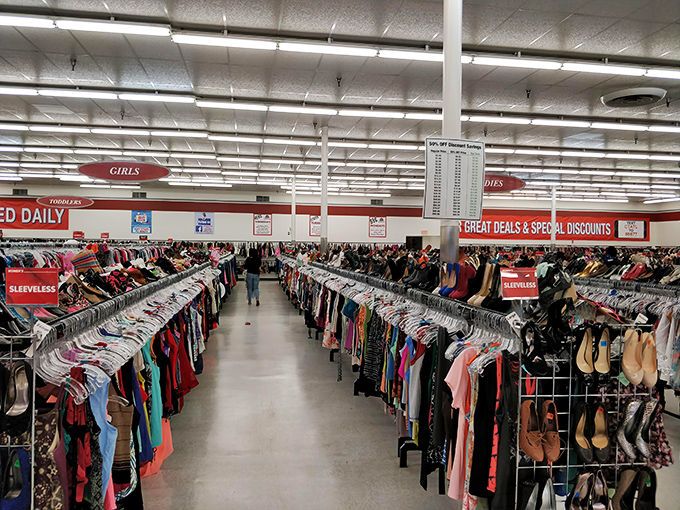 City Thrift's women's department stretches toward the horizon like a sea of fashion possibilities. The "Sleeveless" section alone could outfit a small nation.