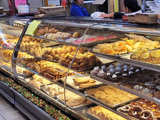 The display case doesn't just hold pastries&mdash;it contains dreams made of flour, sugar, and butter, each one promising a moment of pure, uncomplicated joy.
