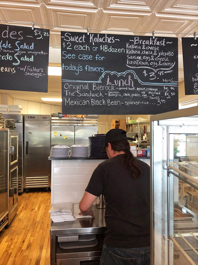 Behind the chalkboard menu, culinary artists craft each kolache by hand&mdash;no assembly lines here, just passion baked into every bite.