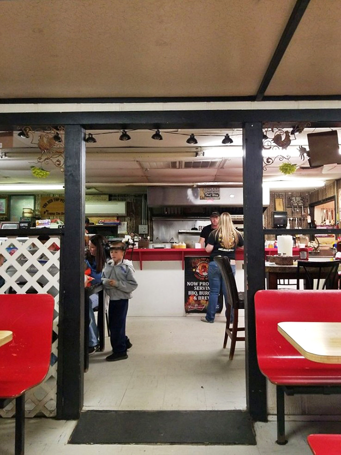 The open kitchen layout means you can watch the magic happen. No smoke and mirrors here&mdash;just smoke and skillful hands creating BBQ masterpieces.