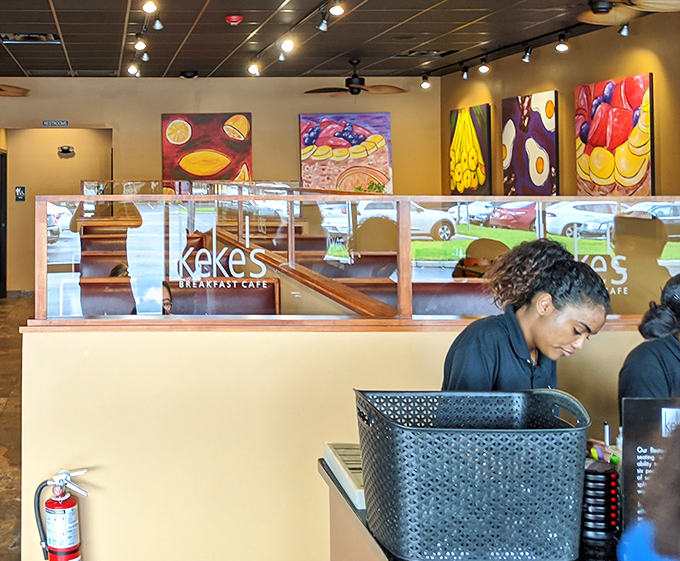 Friendly staff work behind the counter, orchestrating breakfast magic with genuine smiles and expertise.