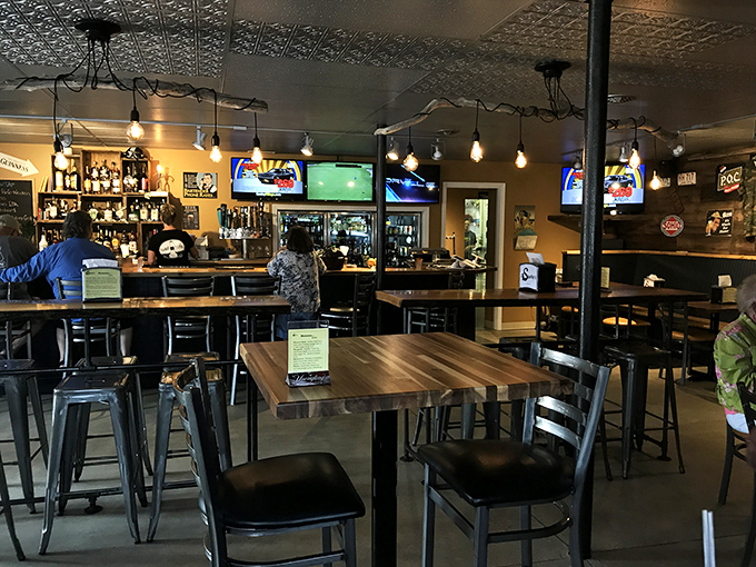 Where magic happens&mdash;the bar area's ornate ceiling tiles and bottle-light fixtures create ambiance that chains spend millions trying (and failing) to replicate.