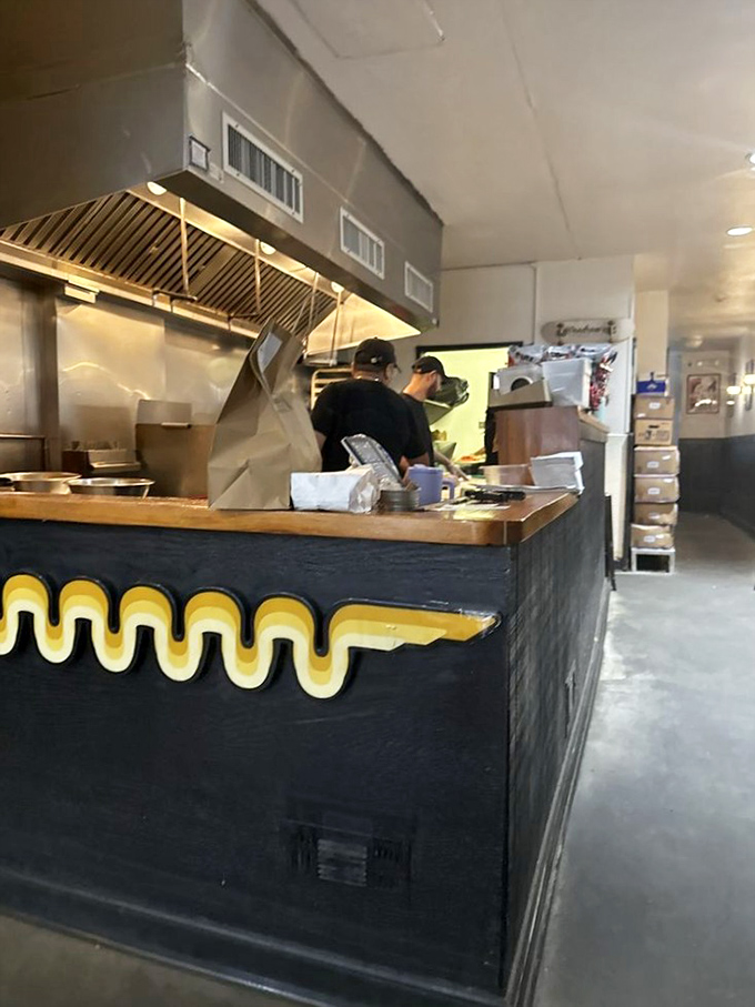 Behind every great sandwich is a team of focused culinary artists. These are the hands that launch a thousand food comas.