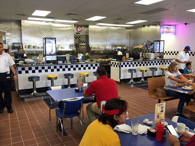 The counter—where solo diners find community, regulars find their usual spots, and everyone finds something delicious.