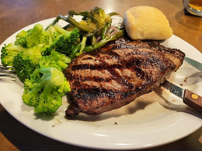 Steak that doesn't need a gimmick, just respect. The grill marks aren't just decoration—they're a roadmap to flavor country, with broccoli riding shotgun.