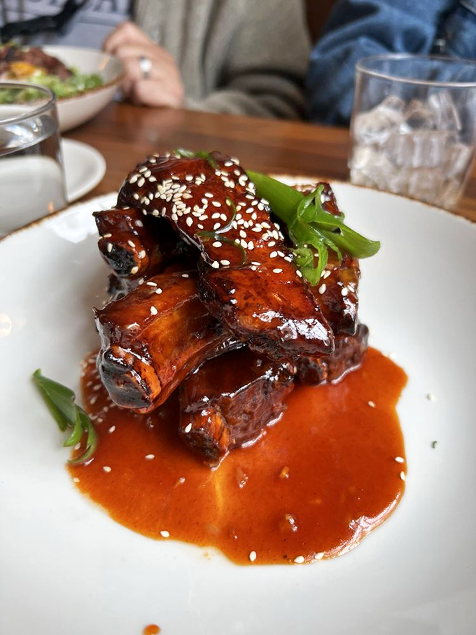 These glazed ribs glisten like edible jewels, promising flavors that will haunt your taste buds in the best way.