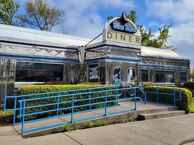 The Blue Moon's exterior shines brightest against Oregon's blue skies. Those blue railings aren't just functional &ndash; they're part of the diner's signature style.