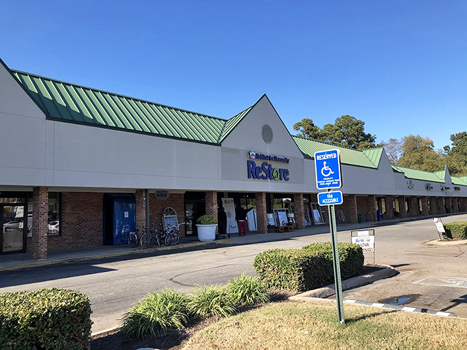 The green-roofed storefront stands ready to welcome both donors and shoppers into its cycle of community-building commerce.