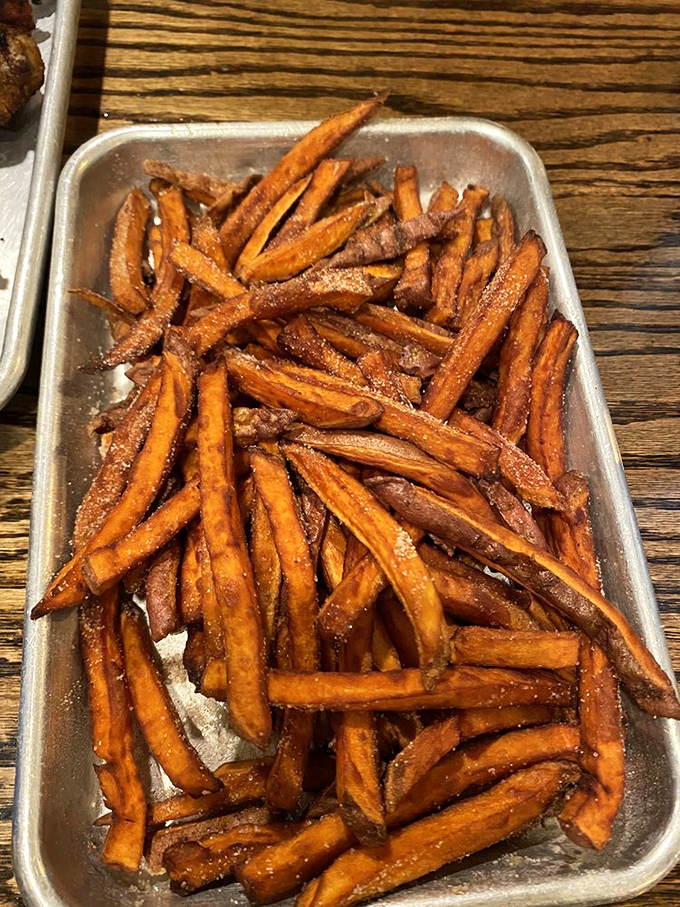 Sweet potato fries with that perfect caramelization &ndash; crispy outside, tender inside, and seasoned like they know something we don't. 
