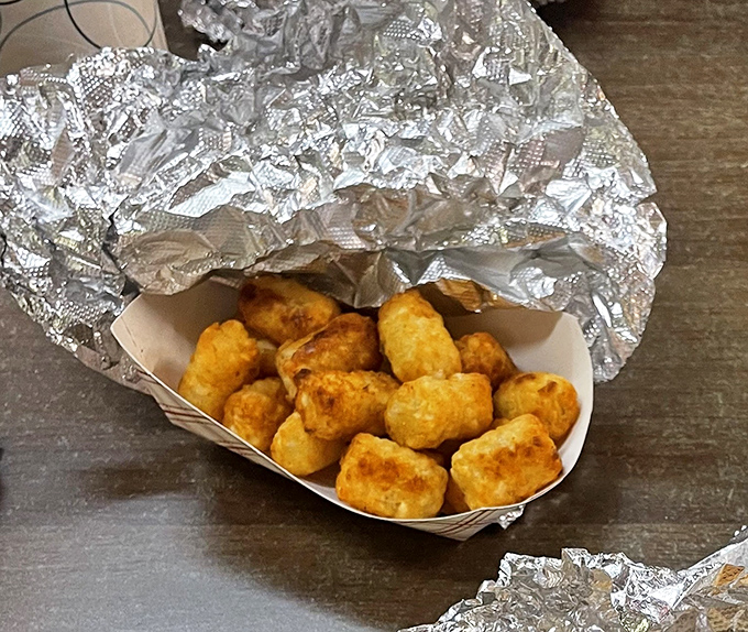 Golden tater tots that crunch like autumn leaves but taste like summer happiness. Perfectly fried little potato pillows that put frozen versions to shame. 