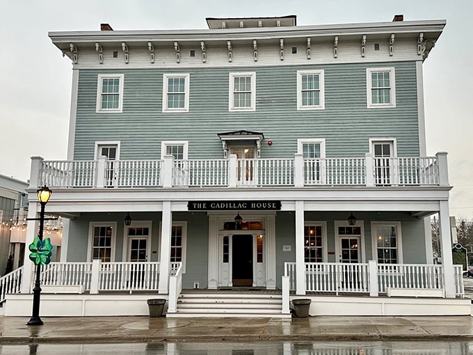 The Cadillac House stands as a testament to preserved elegance, its wraparound porch inviting visitors to step back into a more gracious era.