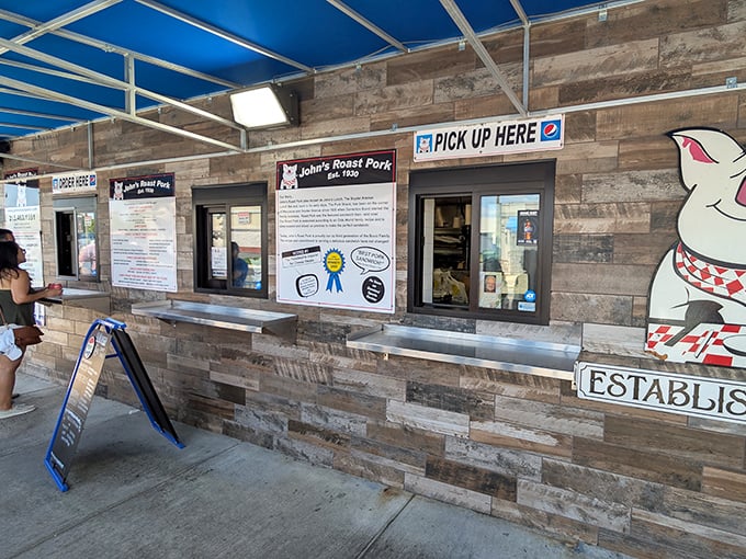 The pickup windows offer a tantalizing glimpse into sandwich paradise. Like pearly gates, but with more broccoli rabe and sharp provolone.
