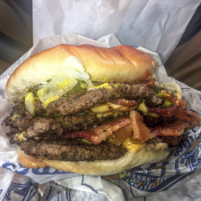 The triple burger &ndash; not for the faint of heart or small of appetite. This magnificent tower of beef, cheese, and toppings is what food dreams are made of.