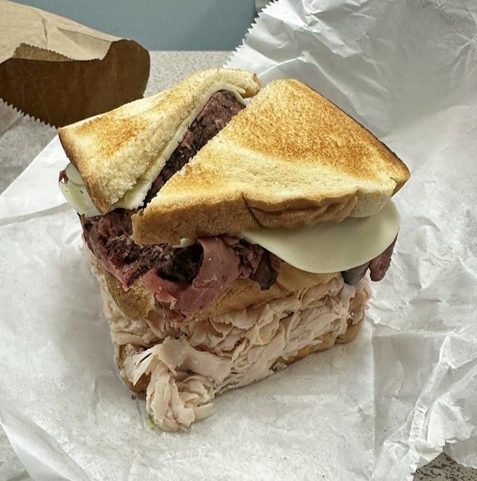 This turkey and roast beef creation proves that sometimes the best relationships are unexpected combinations. A sandwich love story in every bite.