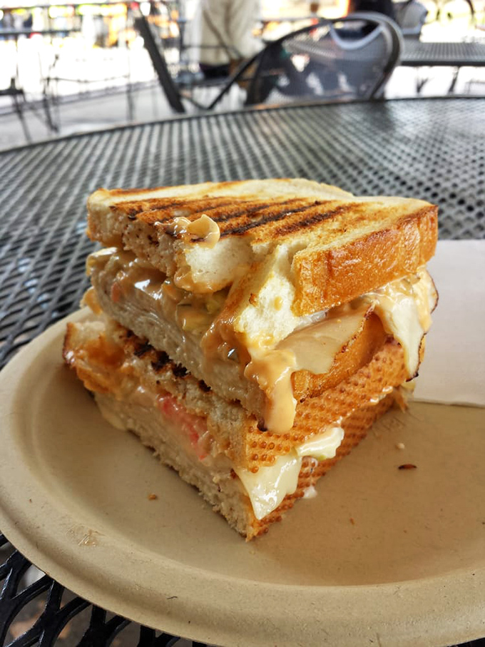 A grilled sandwich with layers that tell a story. Each bite is a different chapter, and you'll want to read the whole book.