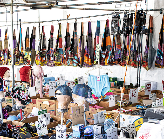 Colorful bags hang like exotic fruit above tables of treasures&mdash;the ultimate "I don't need it but can't leave without it" section.