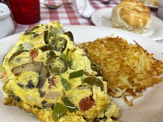 This veggie omelet doesn't apologize for its jalape&ntilde;o kick. Paired with that golden hash brown patty, it's breakfast nirvana on a plate.