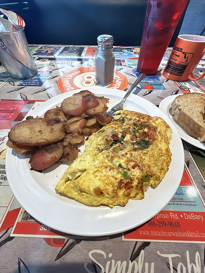 Veggie Omelet and Home Fries: Breakfast of champions&mdash;a fluffy omelet stuffed with veggies alongside potatoes that have achieved that perfect crisp-tender balance that home cooks dream about.