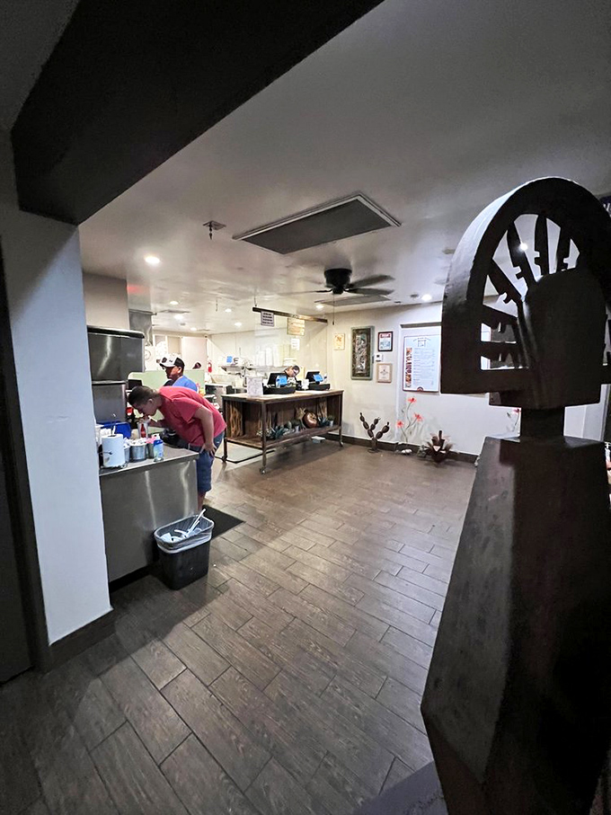 Behind the scenes where the magic happens. That rustic wooden counter has witnessed countless pieces of dough transform into golden fry bread perfection.