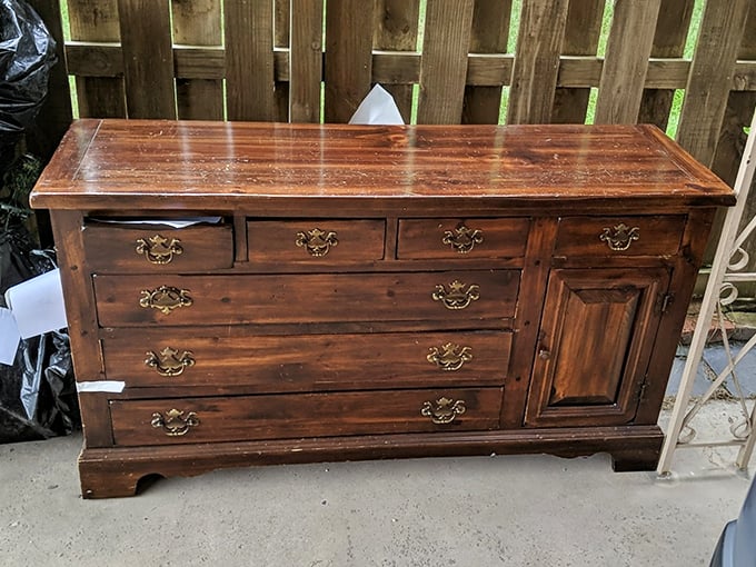This vintage dresser has quietly held sweaters and secrets for decades, its brass handles polished by generations of morning routines.