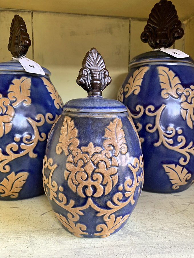 Blue and gold urns fit for royalty—or at least for that fancy corner cabinet where you display things guests aren't allowed to touch.