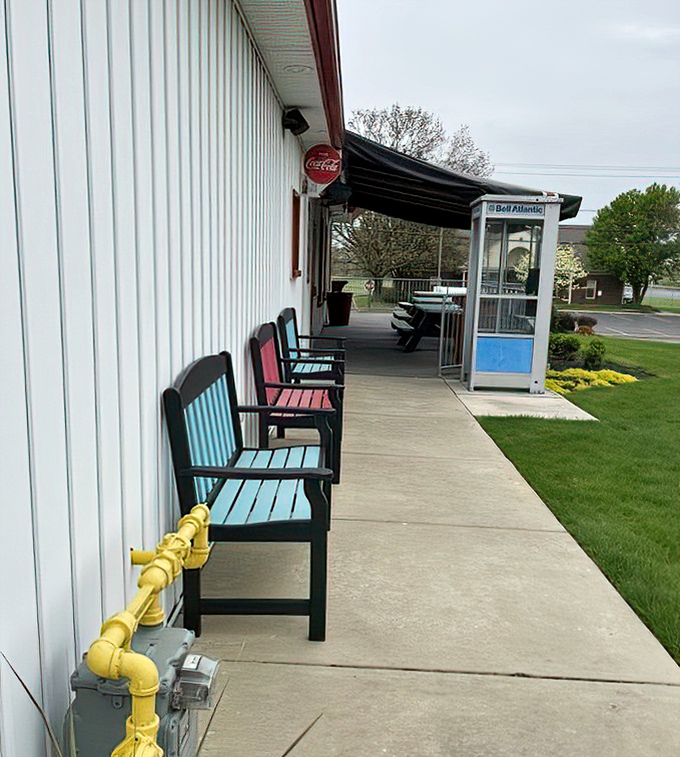 The waiting area features that endangered species&mdash;a genuine phone booth. Superman would approve of this preservation effort.