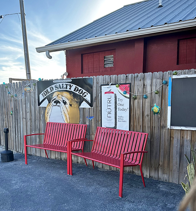 Red benches outside for the wait that's always worth it&mdash;like the anticipation before a great concert or your grandkid's graduation.