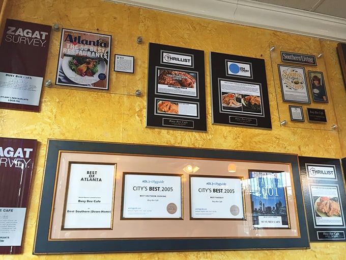 A wall celebrating culinary excellence, where recognition meets the humble pride of authentic Southern cooking.