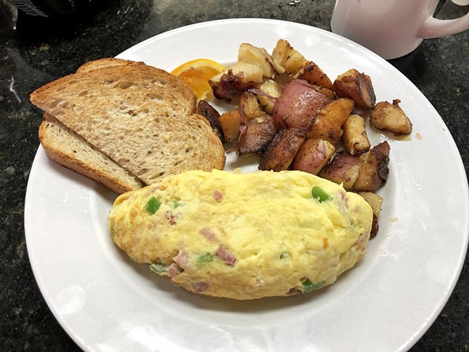 This Western omelet doesn't just contain ham and peppers&mdash;it celebrates them in a fluffy egg embrace that makes morning worth facing.